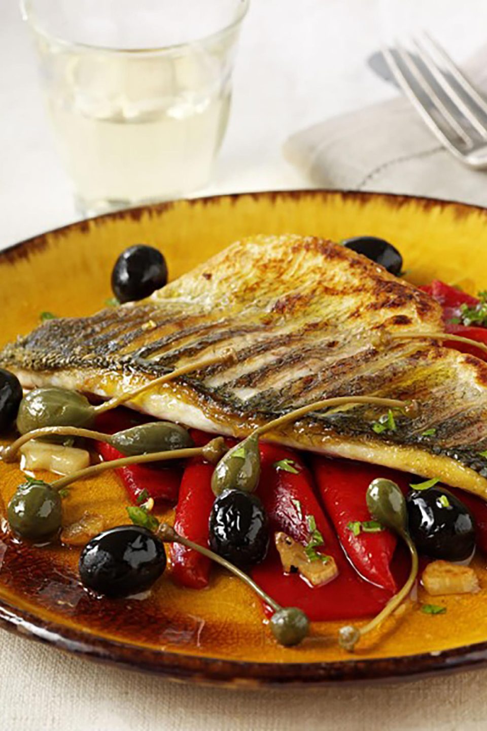 Lubina a la sarten con aceitunas Spanish Tapas Bars Restaurant